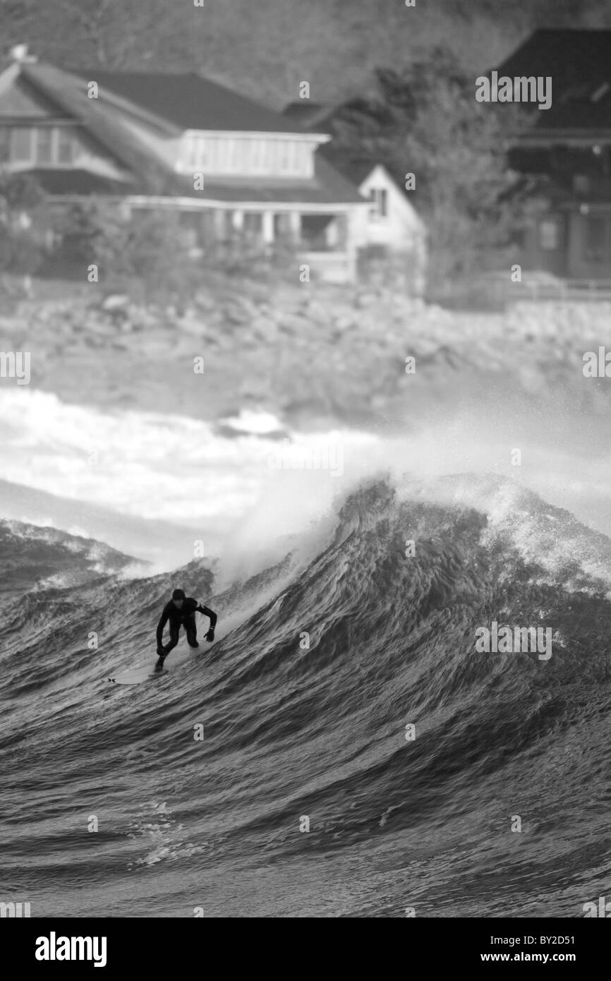 Winter surfer dropping in Stock Photo - Alamy