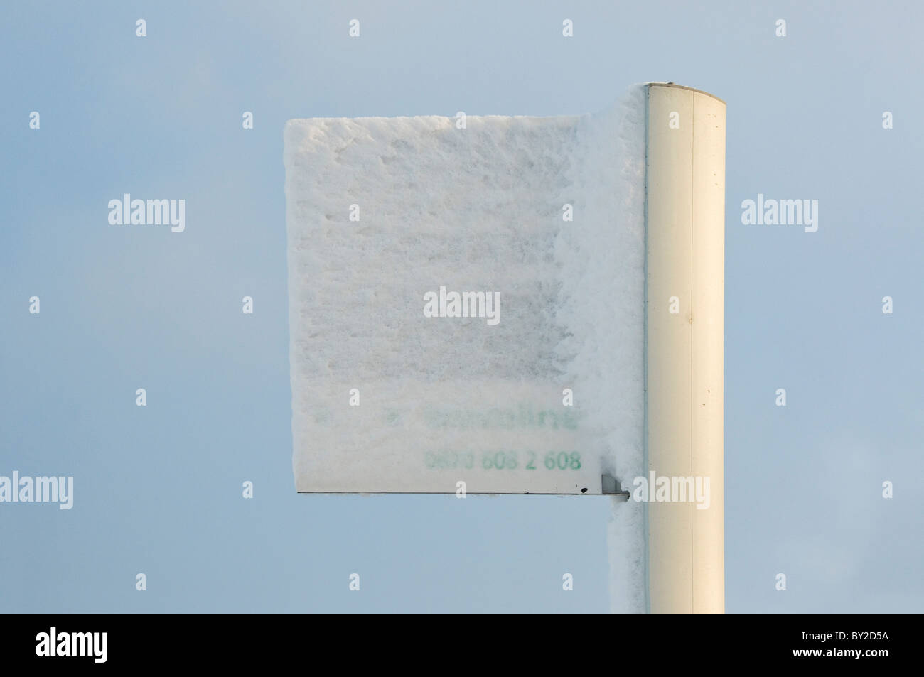 Ice and snow covered "bus stop" sign in North Berwick, East Lothian ...
