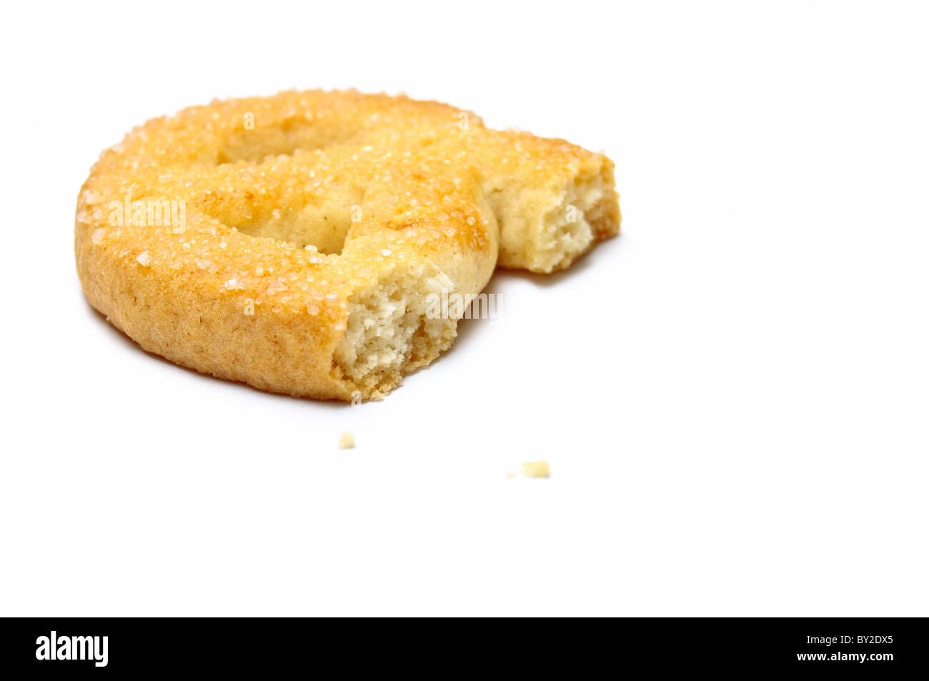 Broken pretzel and crumbs isolated on white Stock Photo - Alamy