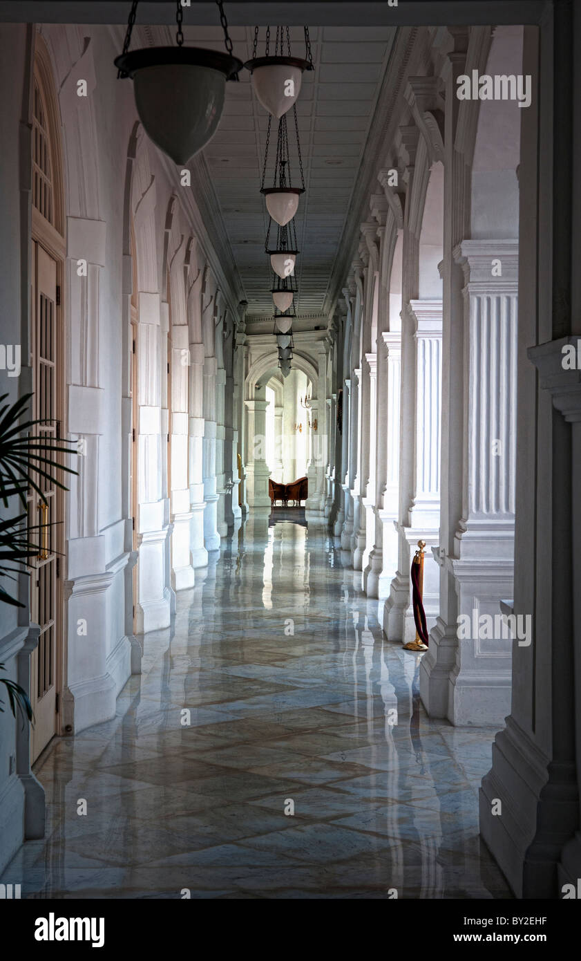 Singapore shadows in hallways of world famous Raffles Hotel 1887 ...