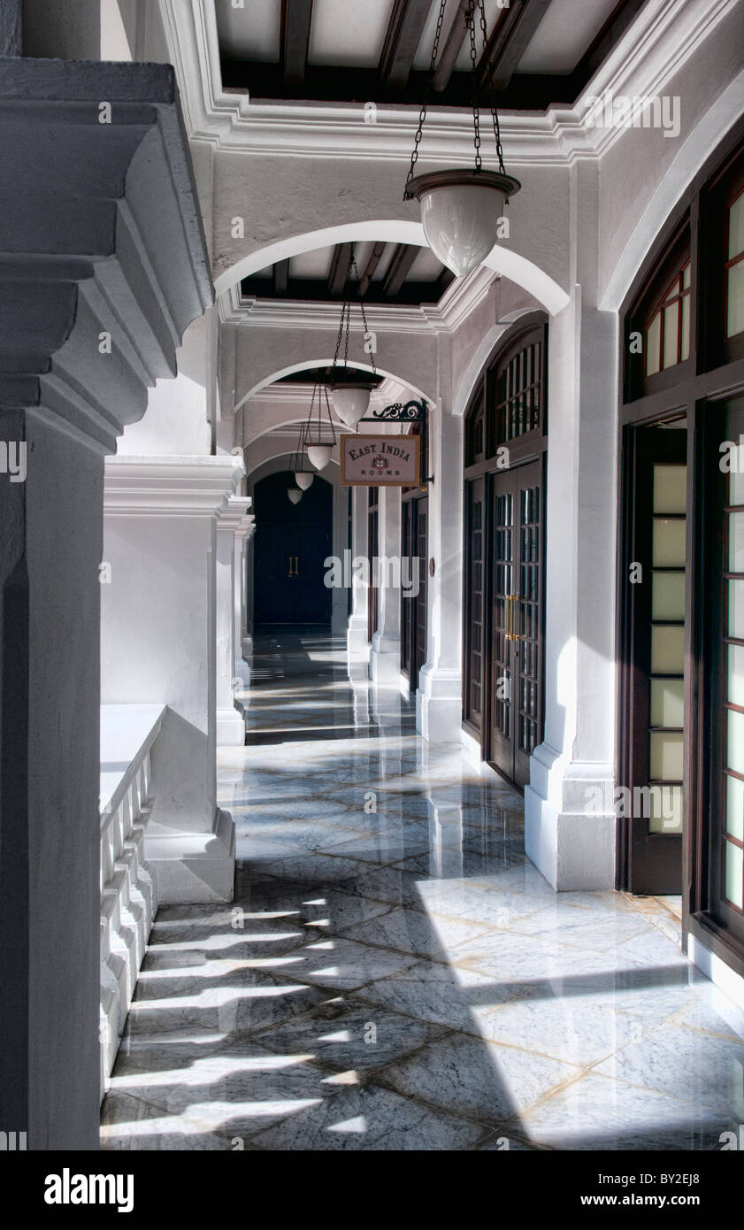 Singapore shadows in hallways of world famous Raffles Hotel 1887 ...