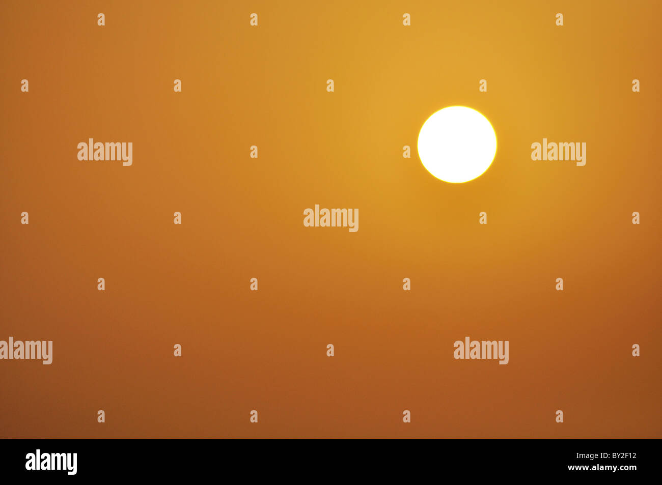 Beautiful orange sunset on the beach Stock Photo - Alamy