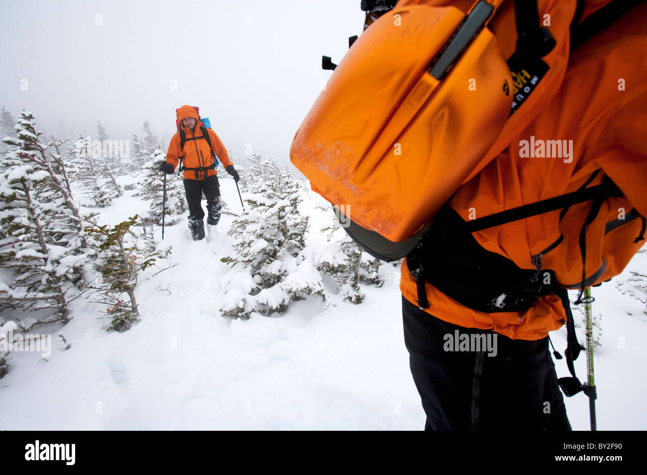 Two men hiking in the snow on Mt. Washington Stock Photo - Alamy