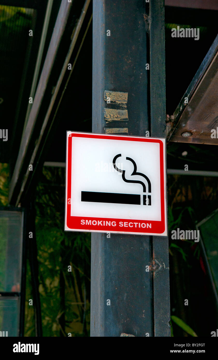 Singapore downtown restaurant with unbelievable SMOKING sign in this ...