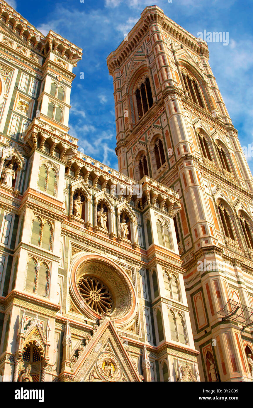 close up of the stone carvings on the facade of Florence Duomo ...