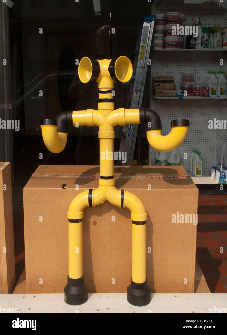 Plumbing pipe person sculpture Stock Photo - Alamy