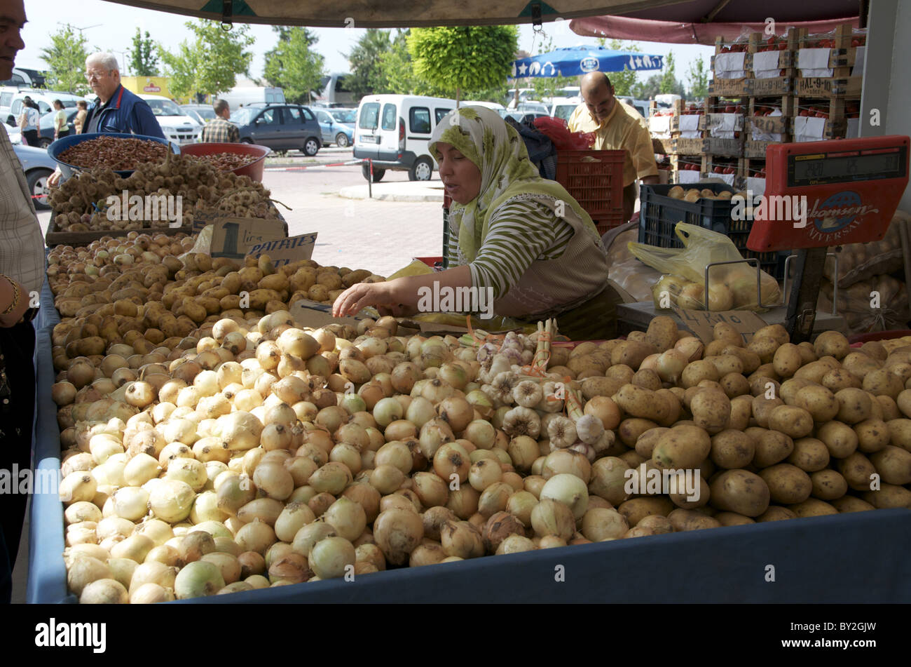 WOMAN SERVES ONIONS POTATO'S DIDIUM BAAZAR MARKET DIDIUM TURKEY DIDIUM ...