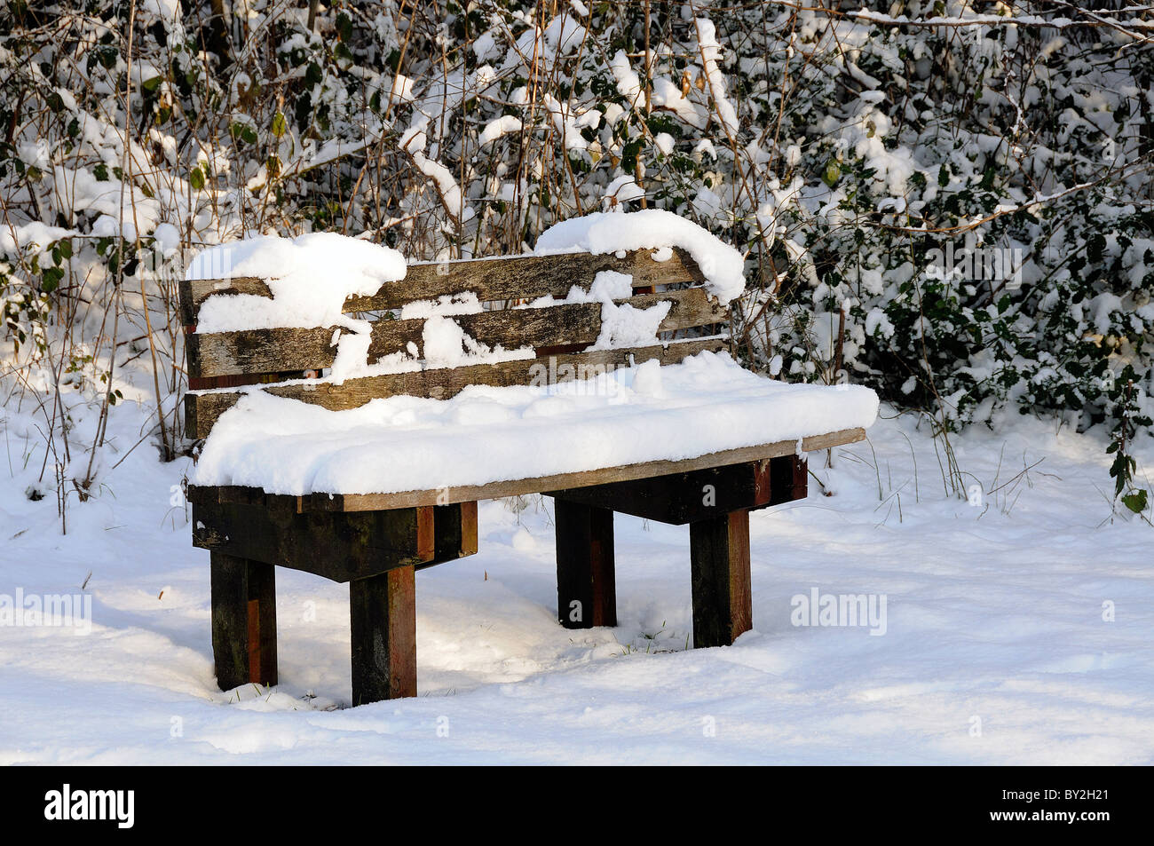 park bench covered in snow Stock Photo - Alamy