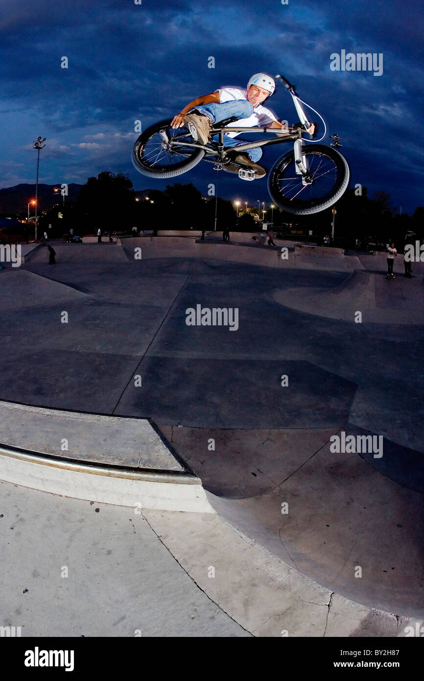 BMX rider jumps at a skatepark Stock Photo - Alamy