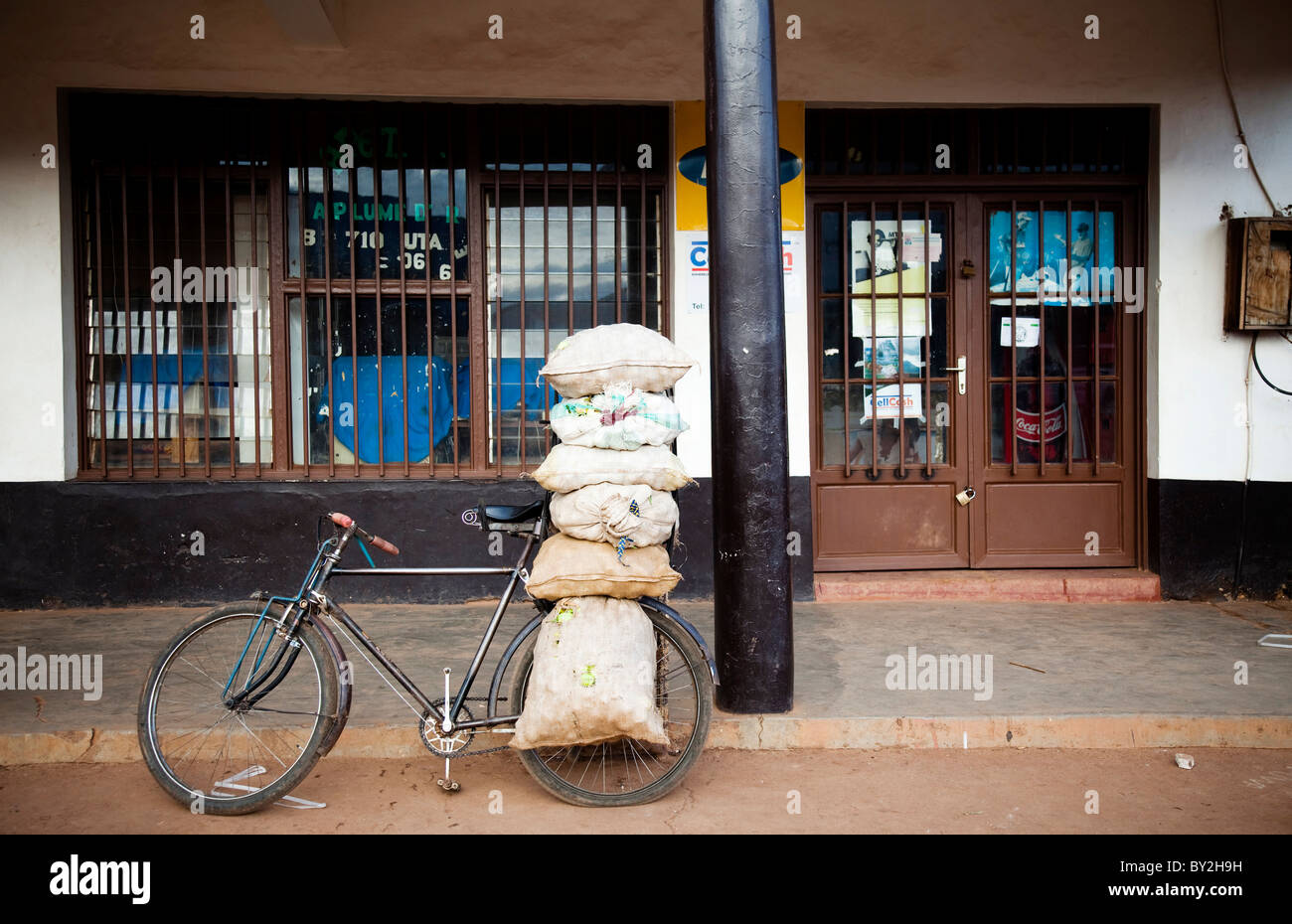 A bike is loaded down with produce in Kigali, Rwanda Stock Photo - Alamy