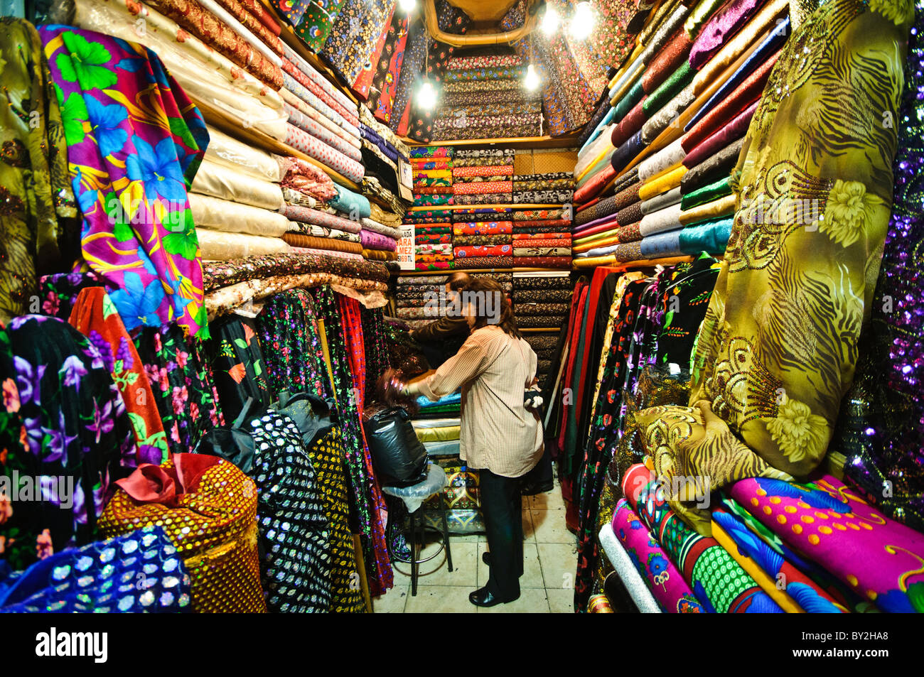 ISTANBUL, Turkey — ISTANBUL, Turkey — Inside a packed fabric store in ...