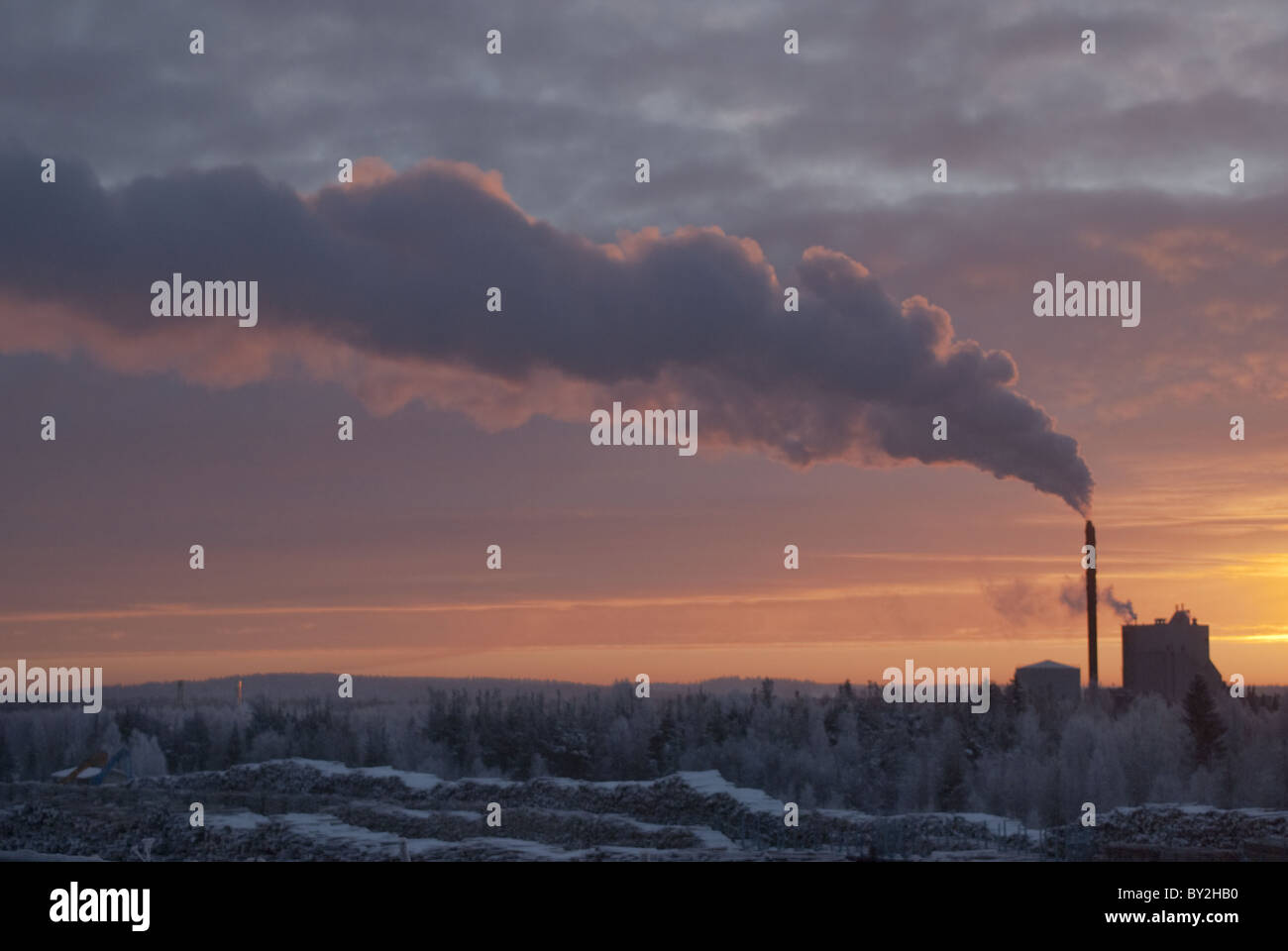 Sun barely rising above the horizon during the cold, short arctic ...