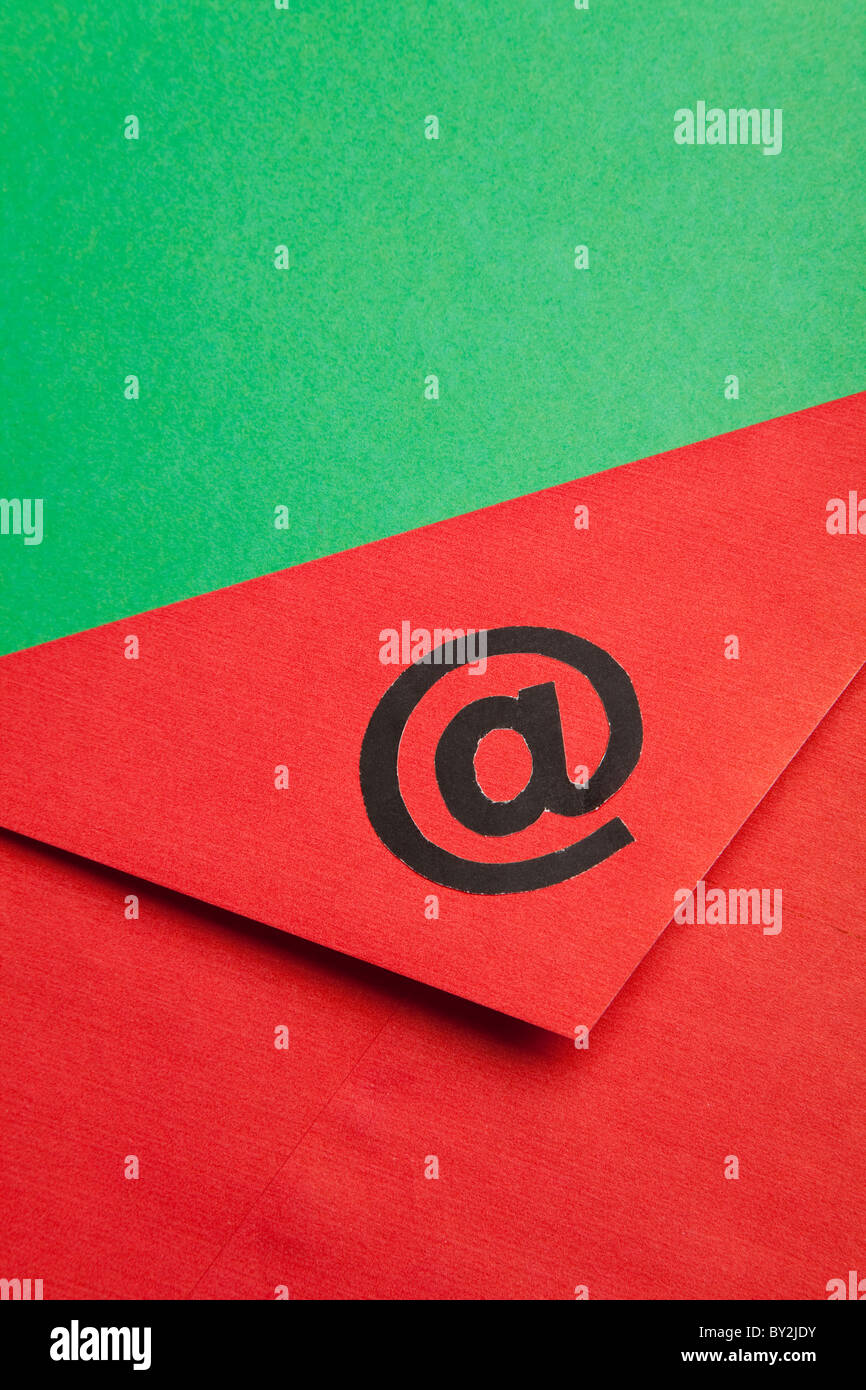 Red Envelope with @ Symbol, concept of E-Mail Stock Photo - Alamy