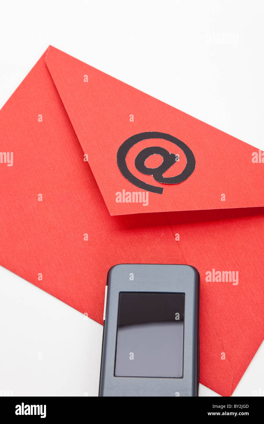 Red Envelope with @ Symbol, concept of E-Mail Stock Photo - Alamy