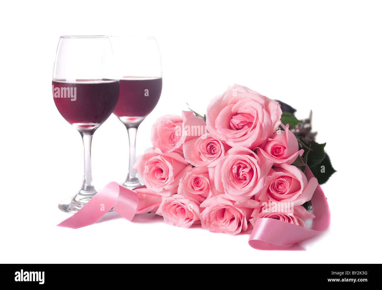 Pink roses and wine isolated Stock Photo - Alamy