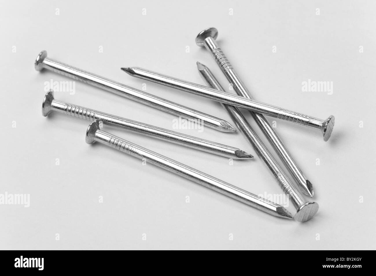 Metal nails close up shot Stock Photo - Alamy