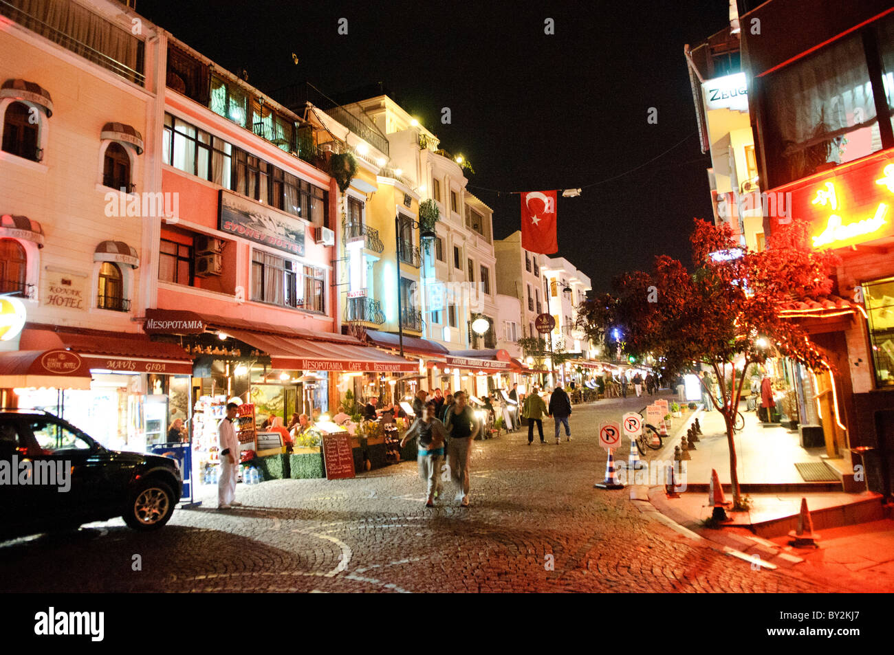 ISTANBUL, Turkey / Türkiye — Night shot of a street of restaurants and ...