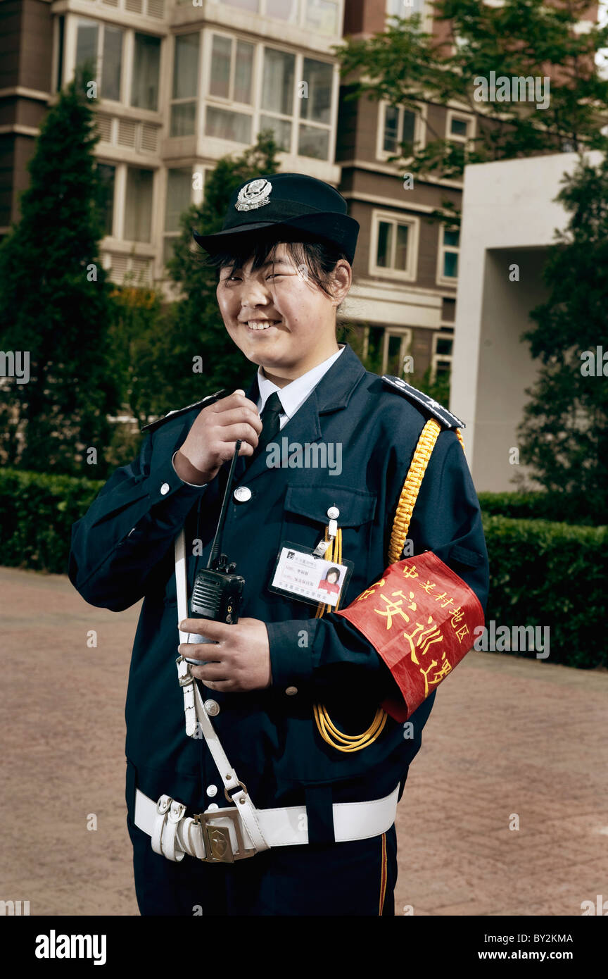 A young chinese female guard Stock Photo - Alamy