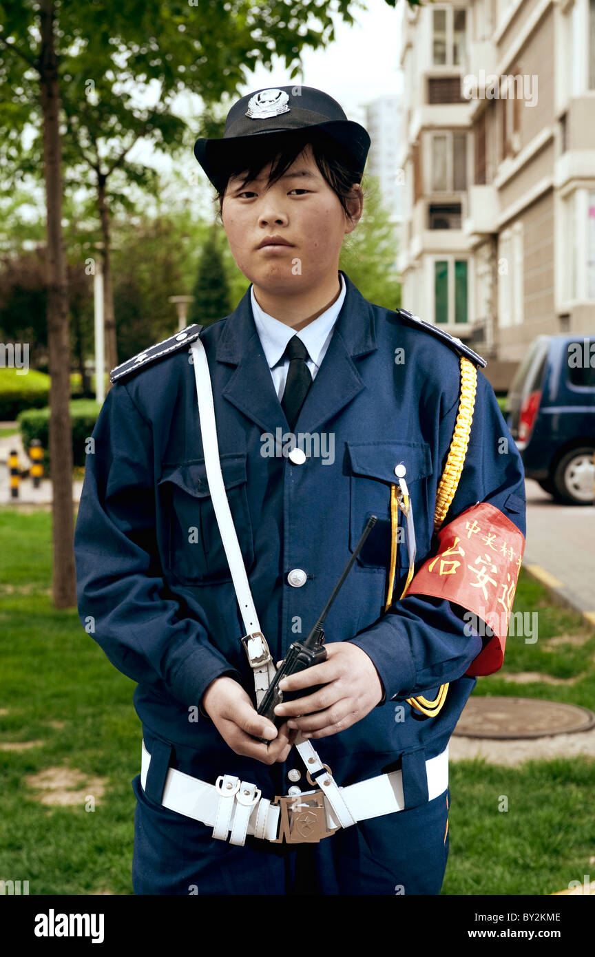 A young chinese female guard Stock Photo - Alamy
