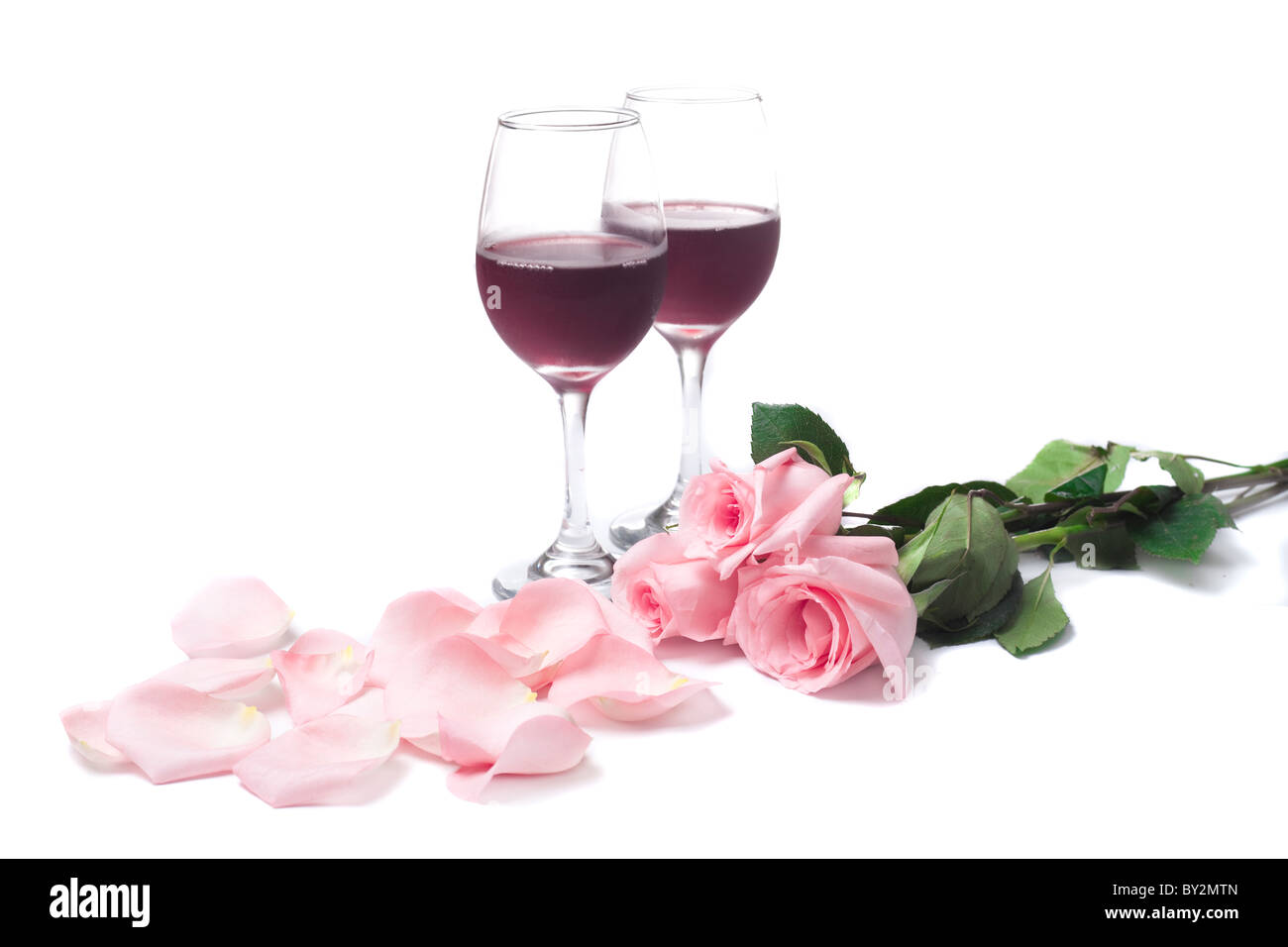 Pink roses and wine isolated Stock Photo - Alamy