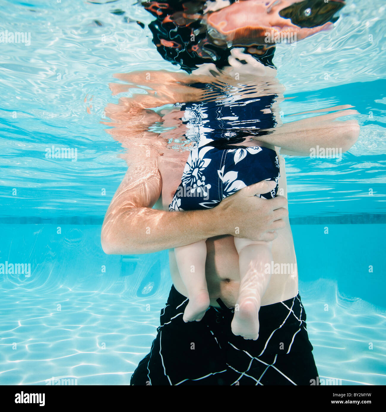 Father Son Swimming Underwater In Stock Photos & Father Son Swimming ...