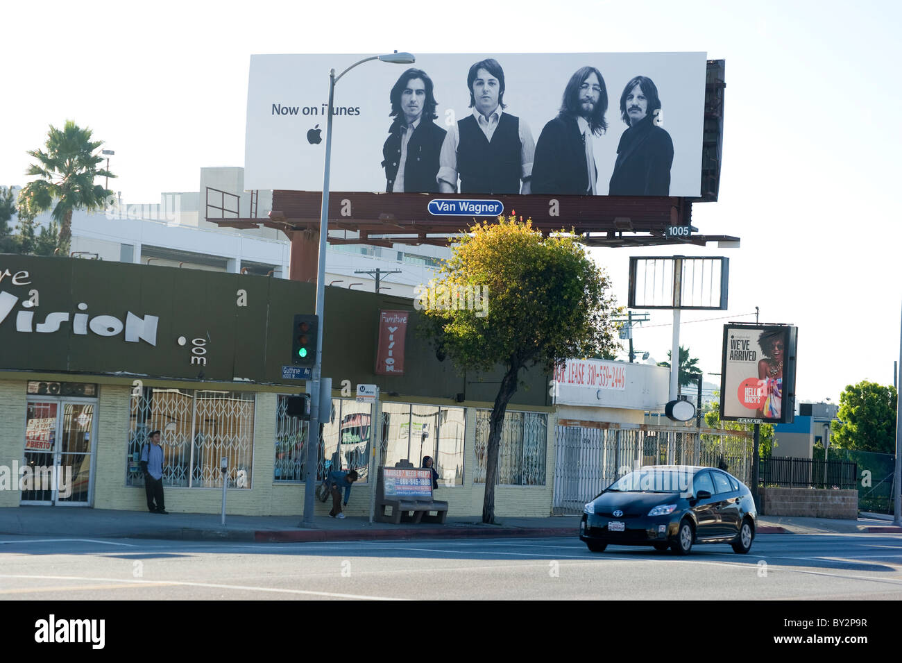 The Beatles appear on a billboard for i tunes Stock Photo - Alamy
