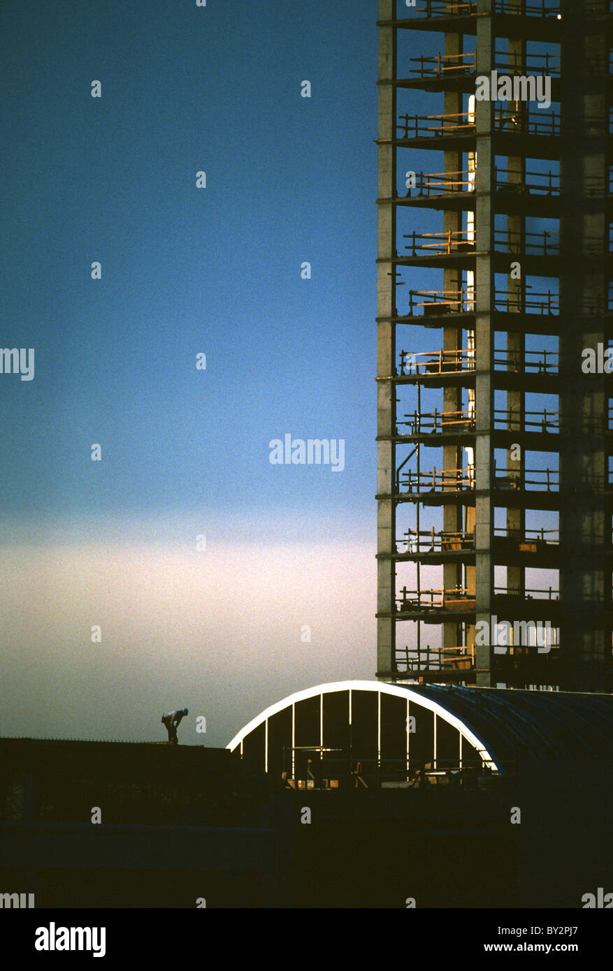 worker at commercial high rise construction site in Dallas, TX Stock ...