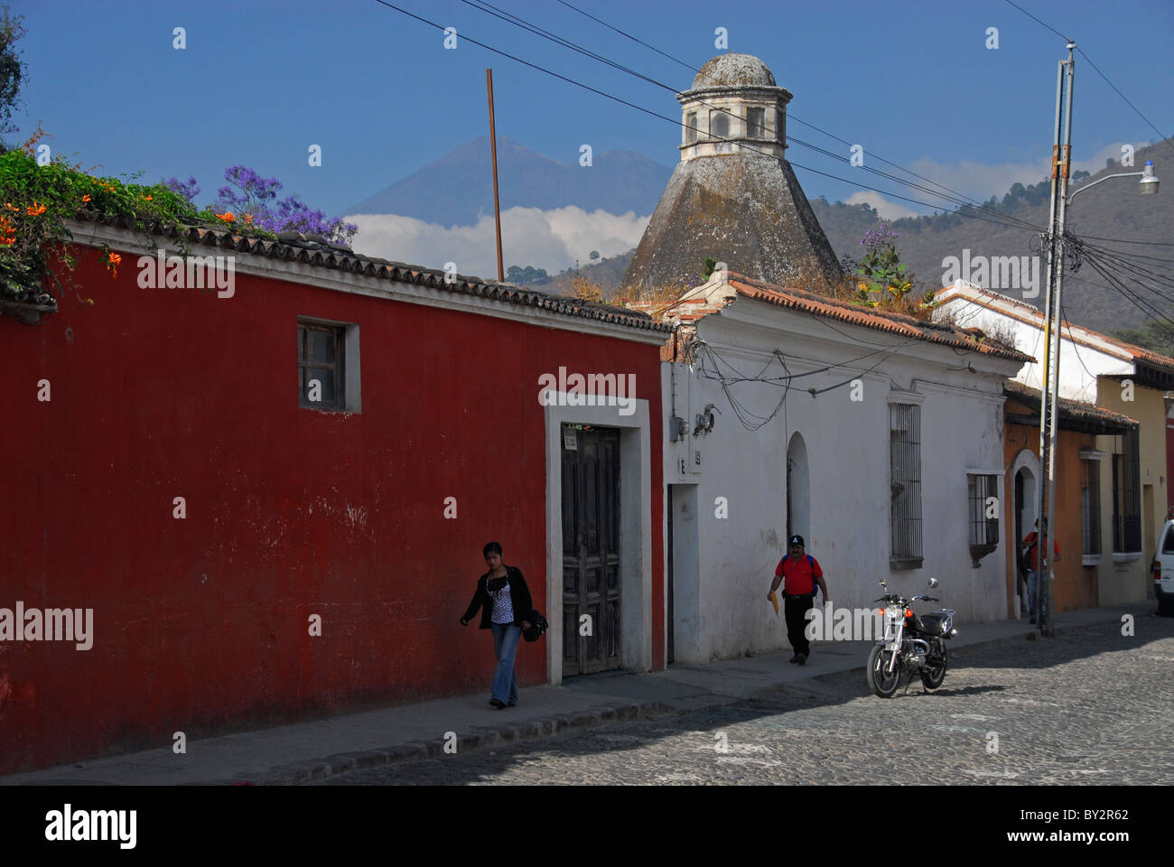 Street view with Volcan de Fuego in the background Stock Photo - Alamy