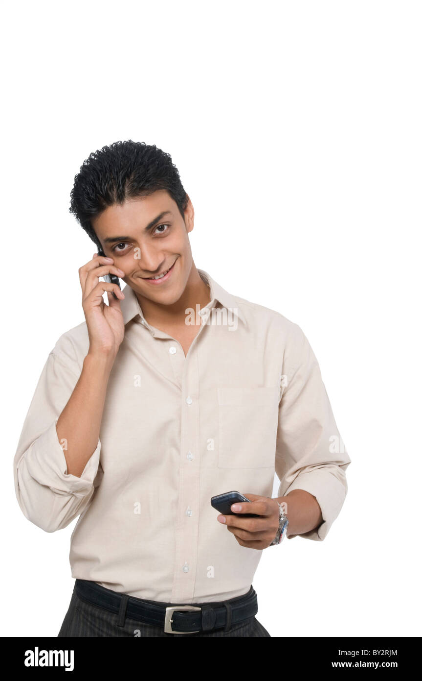 Young indian man facing camera hi-res stock photography and images - Alamy