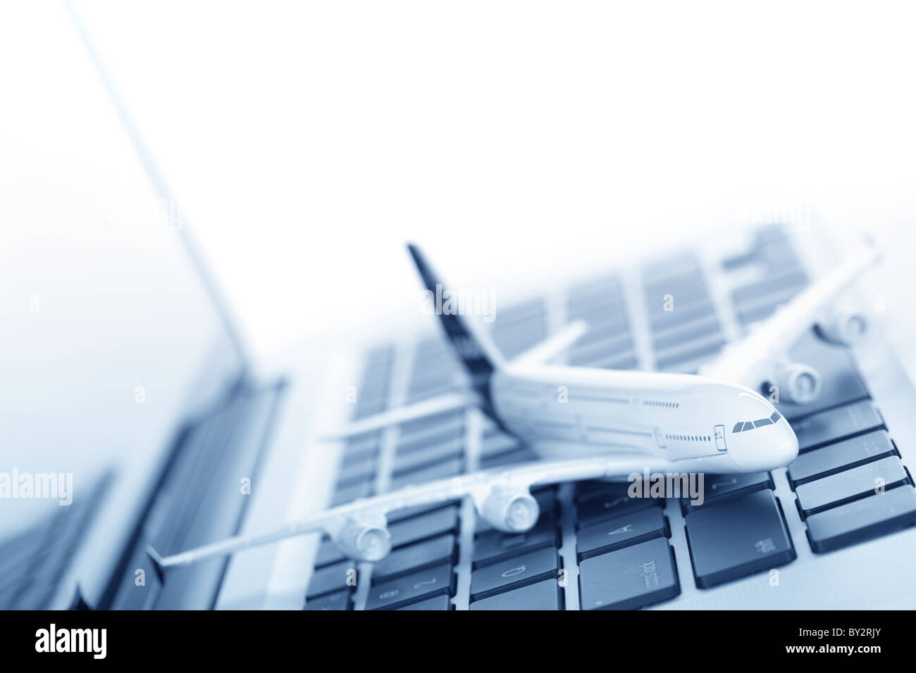 Model plane on laptop keyboard,Closeup and shallow Dof Stock Photo - Alamy