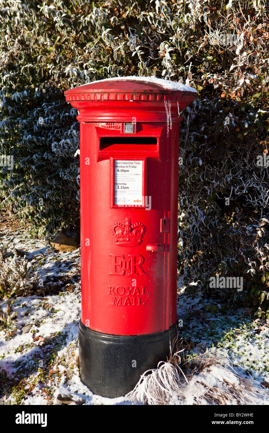 Traditional red Royal Mail post box with icicles Stock Photo - Alamy
