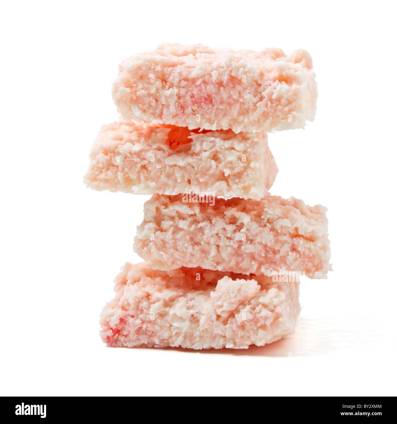 Coconut Ice confectionery isolated on white from low perspective Stock ...