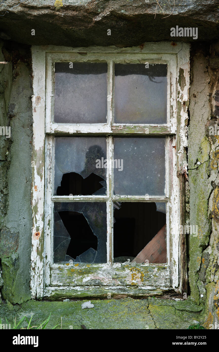 Exterior broken window of derelict croft house, Berneray, Outer ...