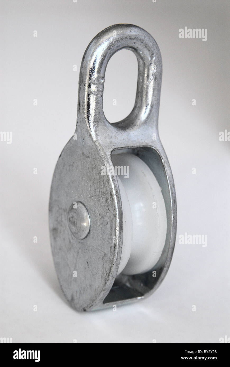 Pulley with metal wheel Stock Photo - Alamy