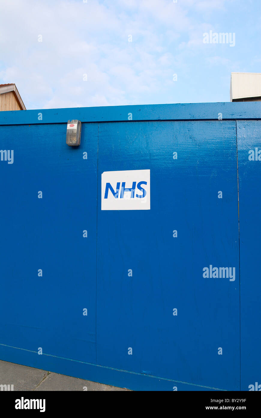 Hoarding on NHS building site Stock Photo - Alamy