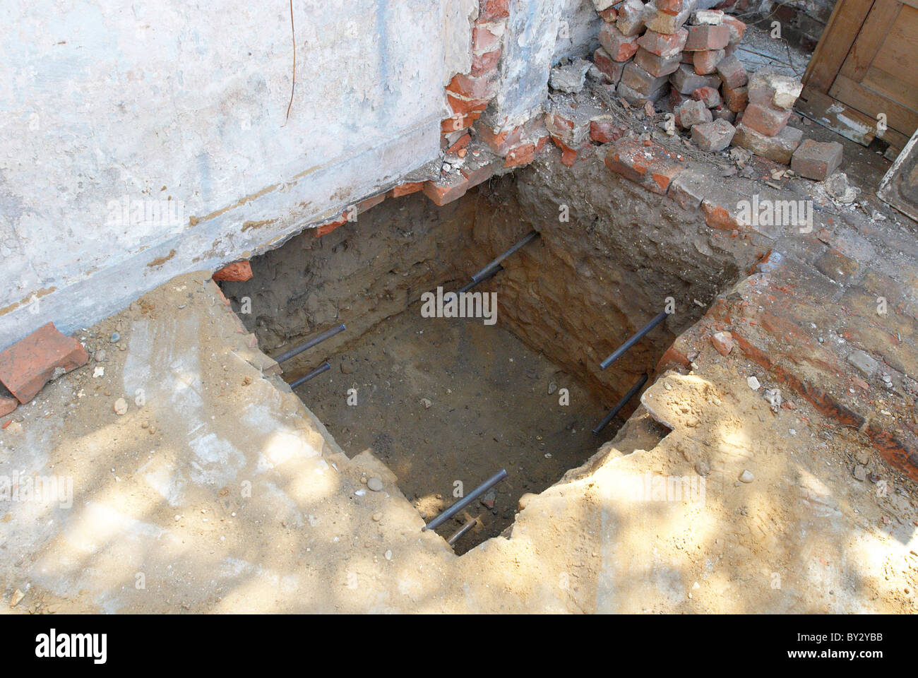 Subsidence repair hole to be filled with concrete to prevent further ...