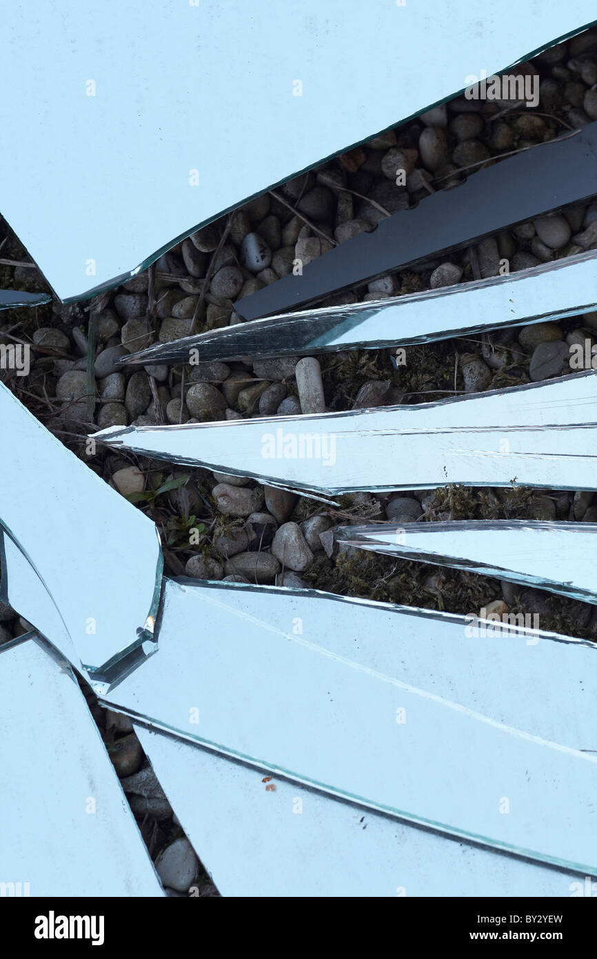 Broken mirror on the ground Stock Photo - Alamy