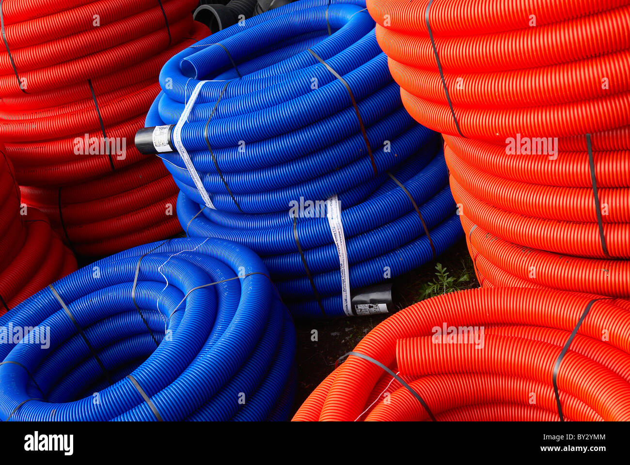 Stack of pipes on a building merchant yard Stock Photo - Alamy