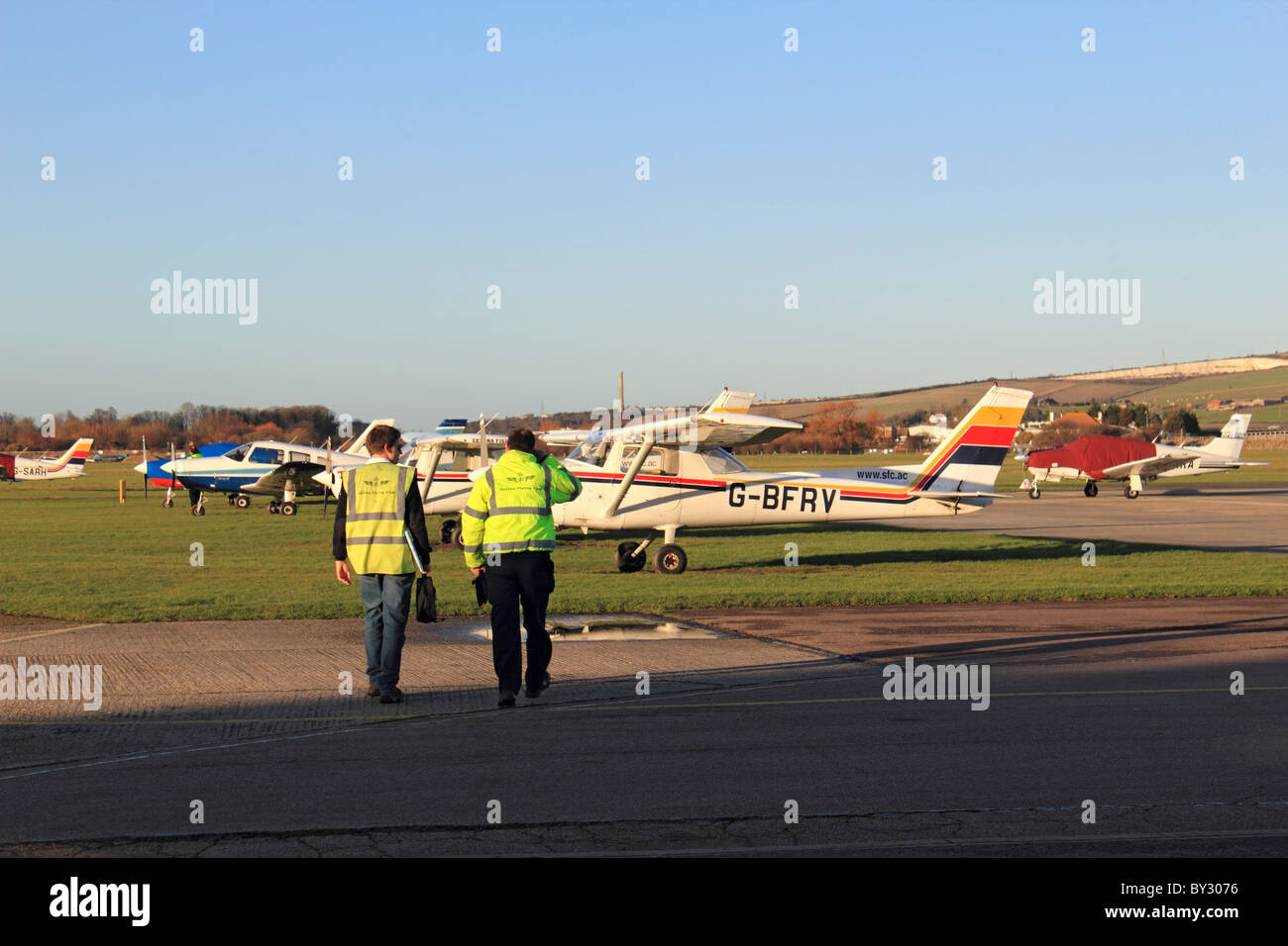 Pilots walking to their light aircraft at Shoreham Airport (Brighton ...