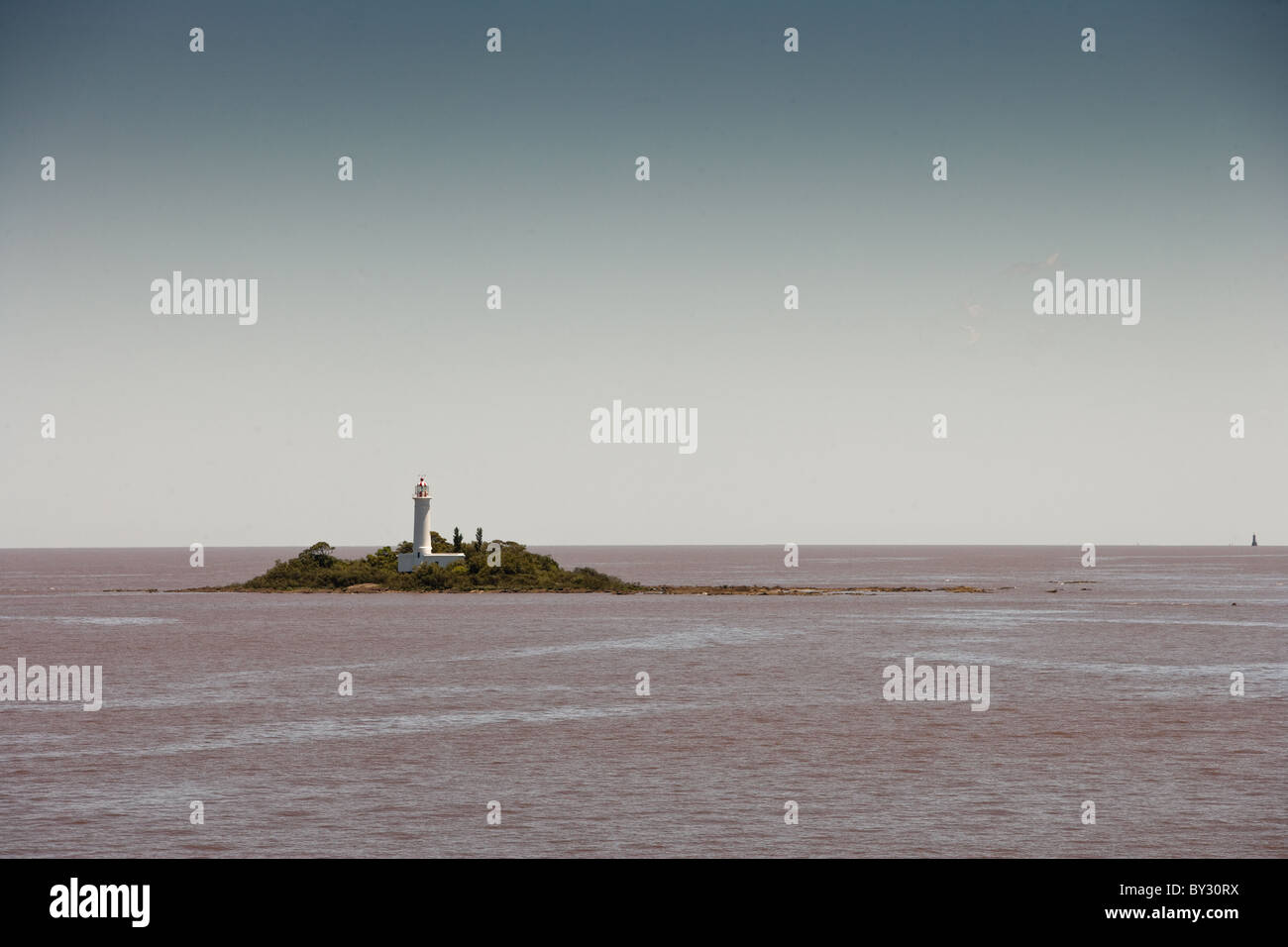 Remote island with lighthouse, Argentina Stock Photo - Alamy