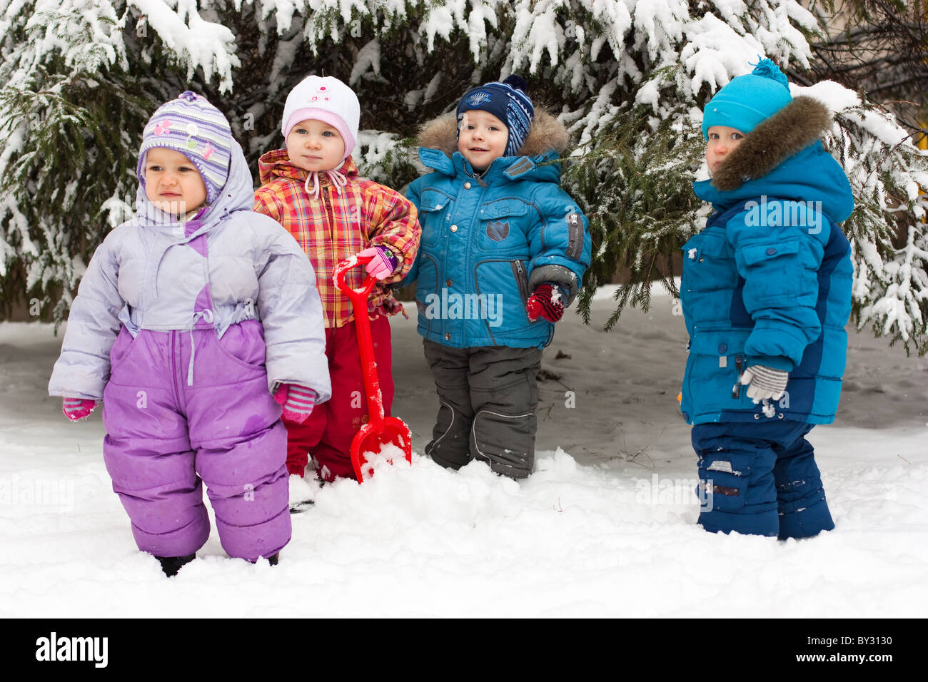 Children playing in snow outdoor in winter Stock Photo - Alamy