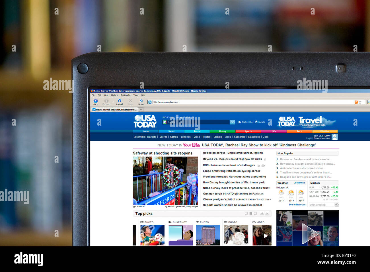 Browsing the USA Today website on a laptop computer, USA Stock Photo ...