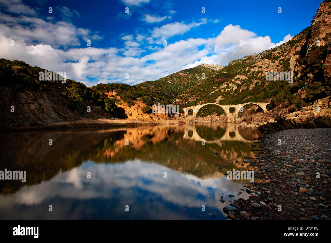 Greece, Thrace, Rodopi prefecture. The old, stone, arched, bridge, of ...
