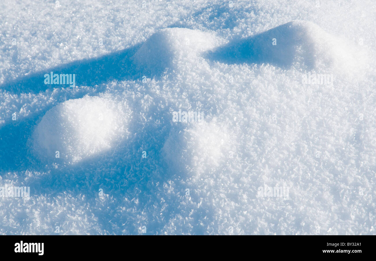 Lying snow after hard frosts showing crystals and sugar like texture ...