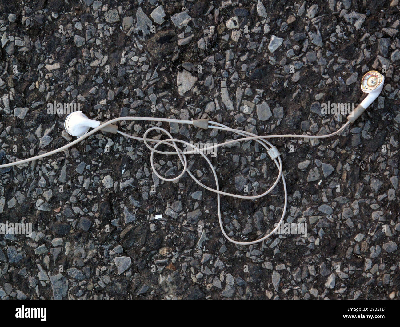 crushed earphones in street Stock Photo - Alamy
