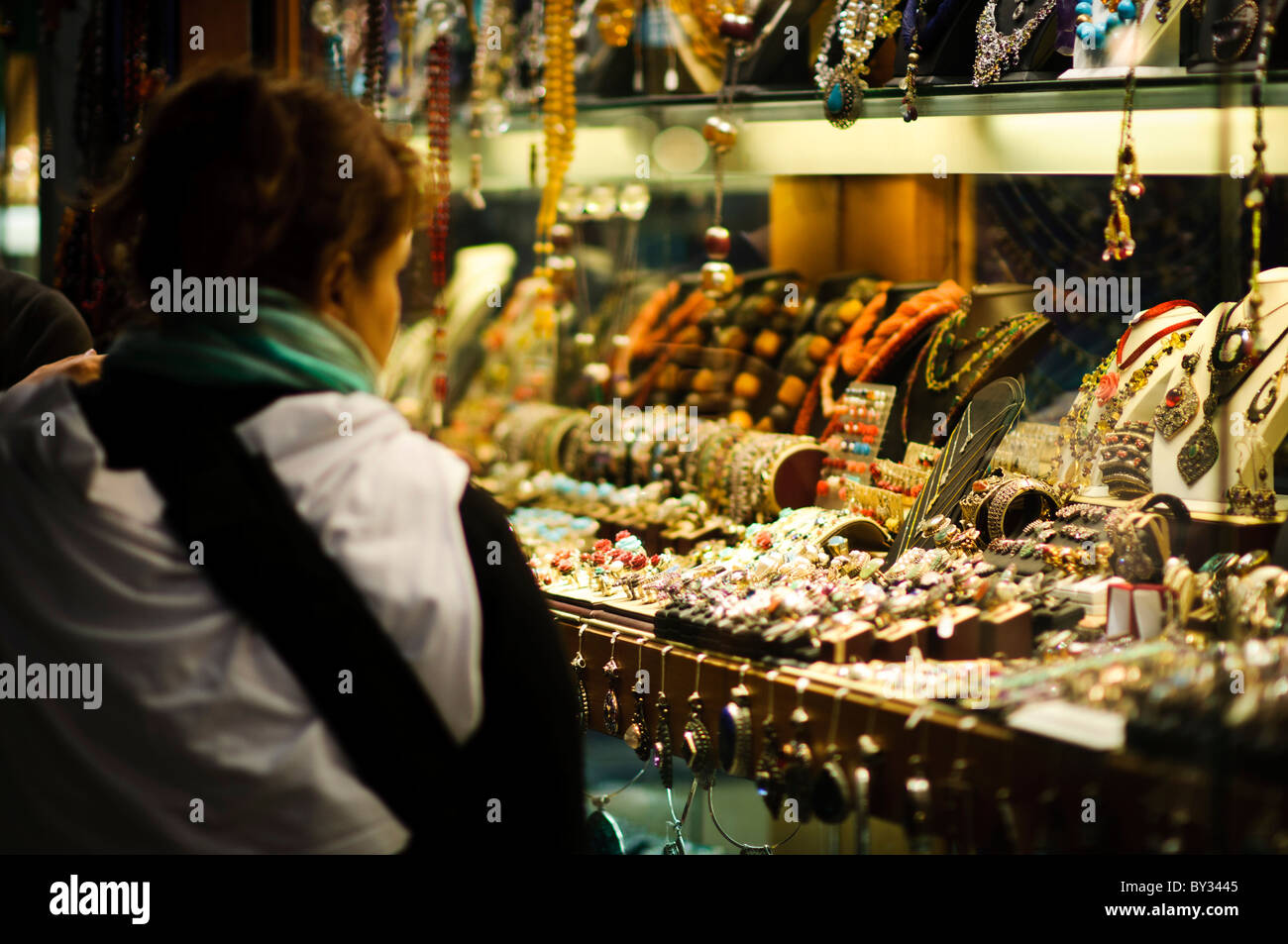 A shopper admires the wares of one of the many jewellery stores inside ...