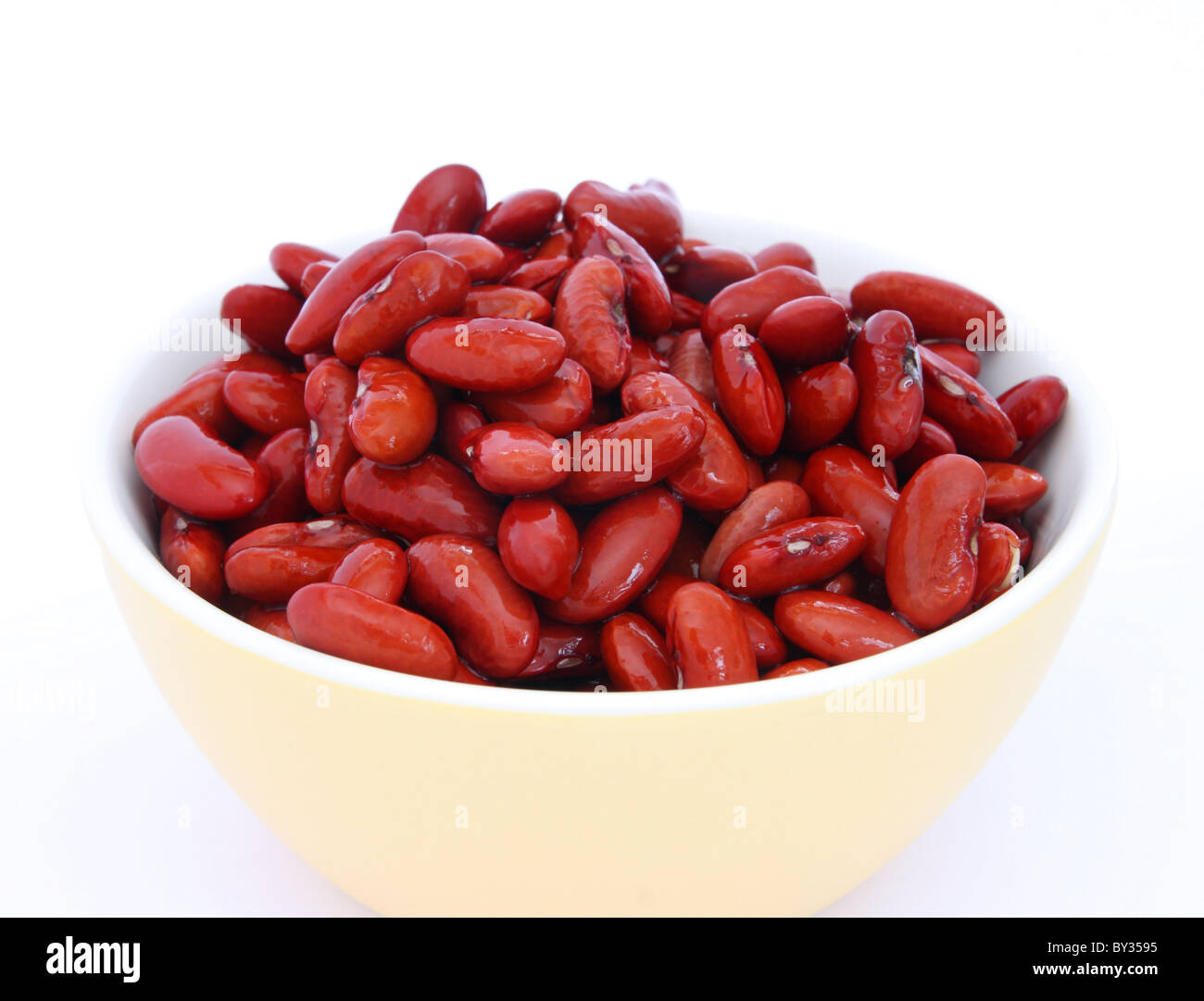 Many cooked red beans in yellow bowl on white background Stock Photo ...