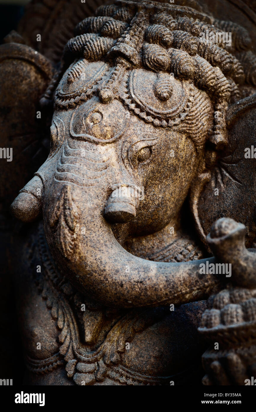 Hindu Elephant God, Lord Ganesha. Ornate granite temple statue. Andhra ...
