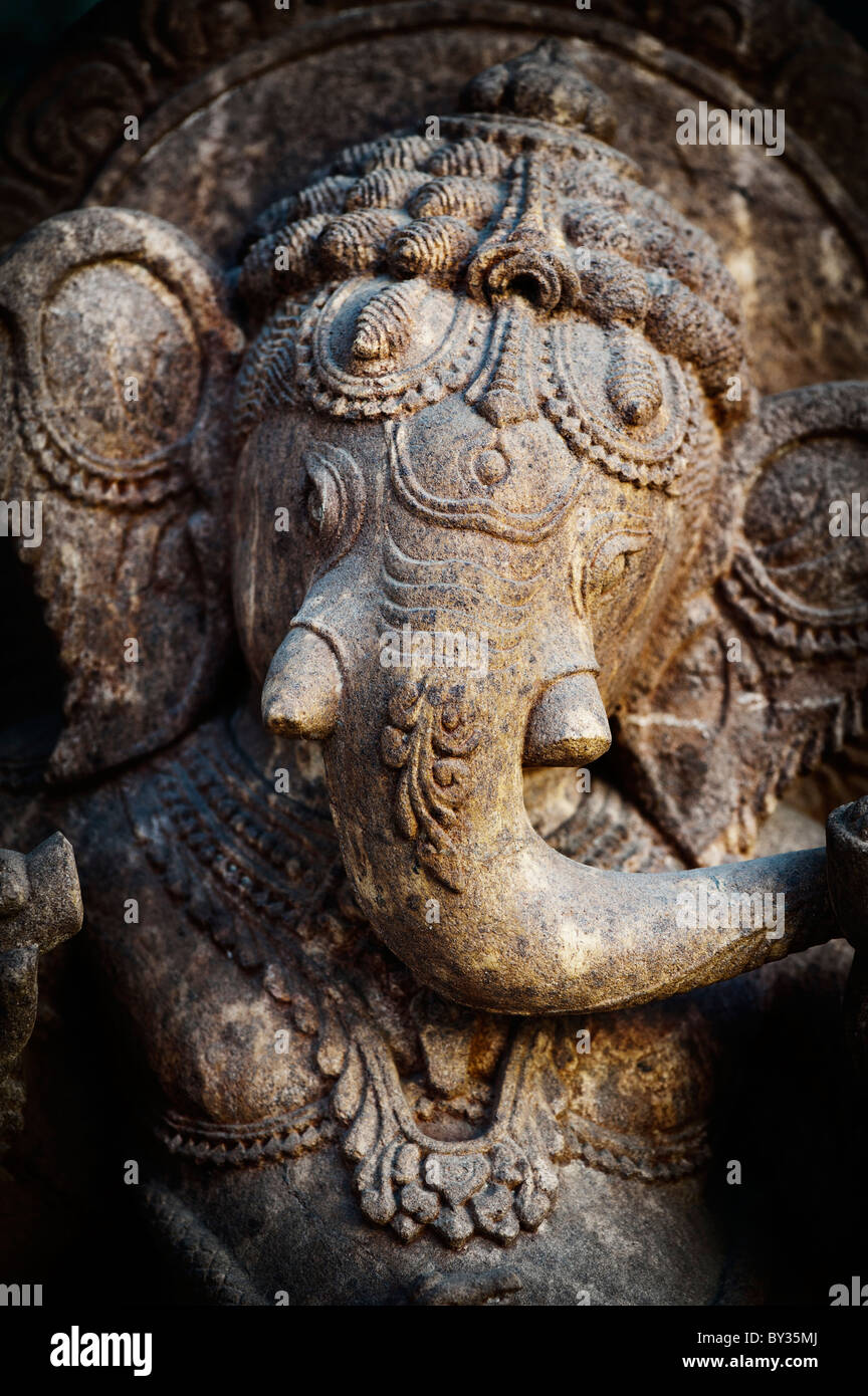 Hindu Elephant God, Lord Ganesha. Ornate granite temple statue. Andhra ...