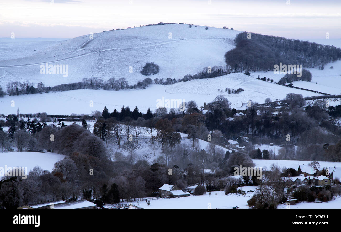 A winter view of Melbury Abbas and Melbury Hill in Dorset, England, UK ...